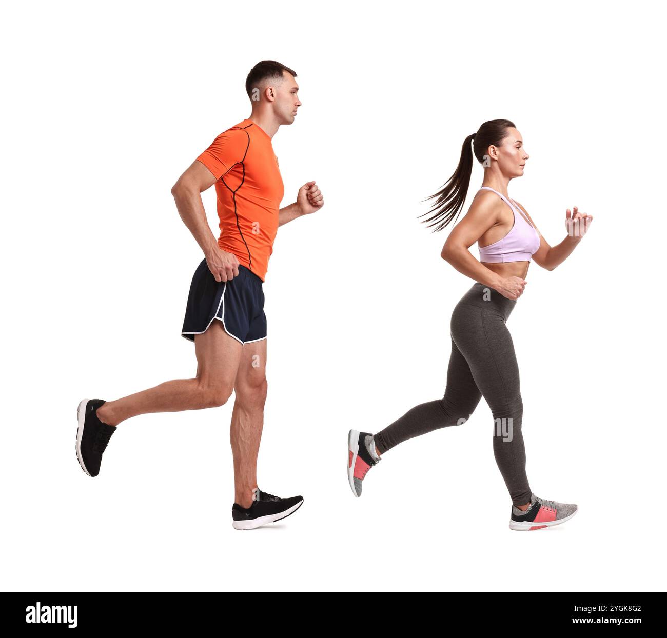 Young athletic couple running Cut Out Stock Images & Pictures - Alamy