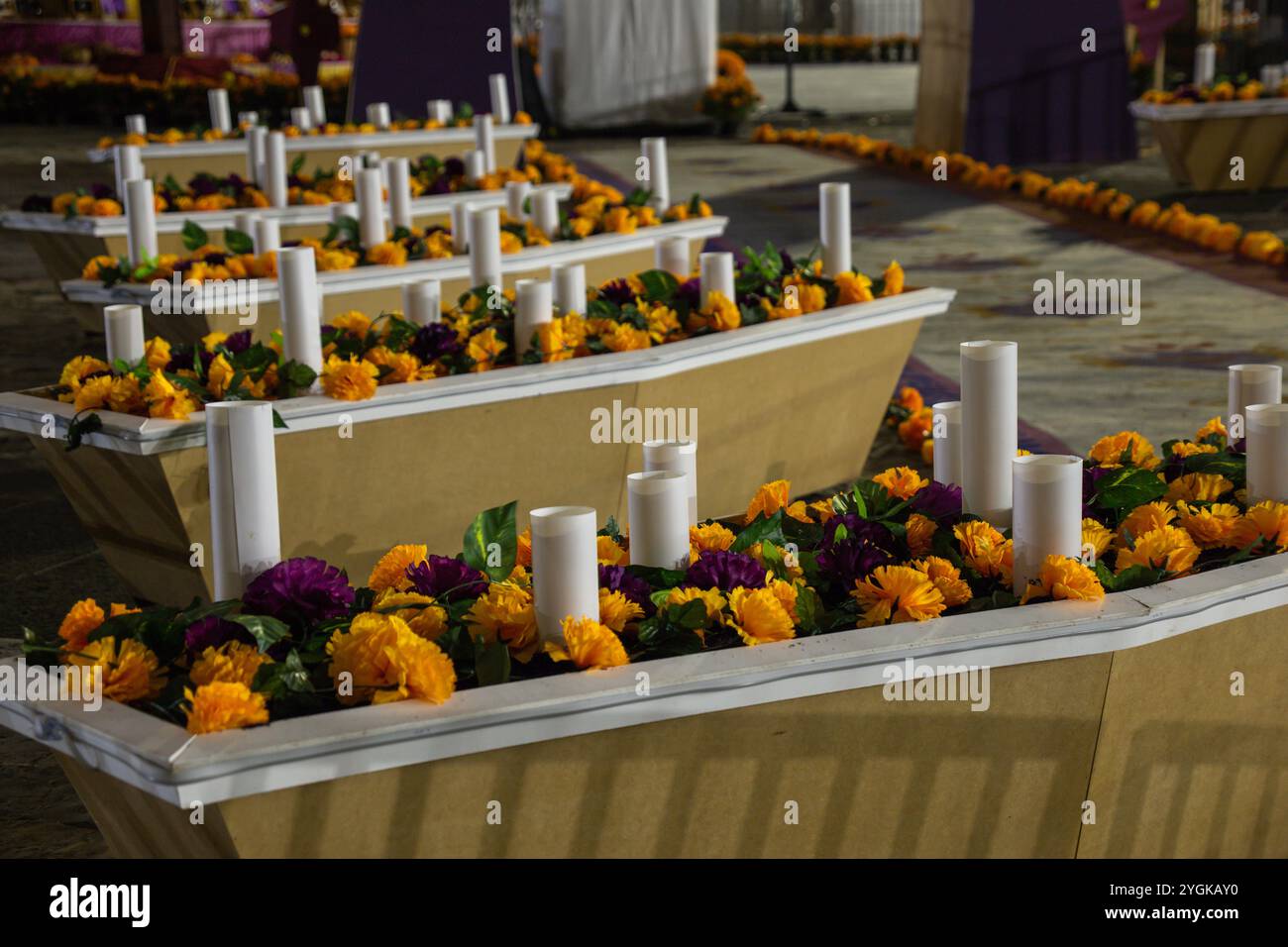 Day of the Dead altar adorned with marigolds, candles and food, set up ...