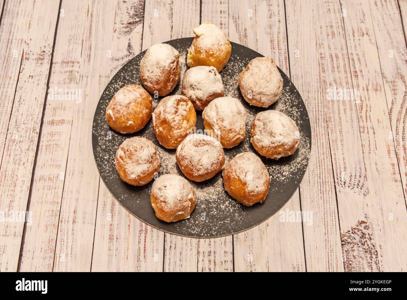 a type of fried fruit of Spanish origin that consists of a spherical ...