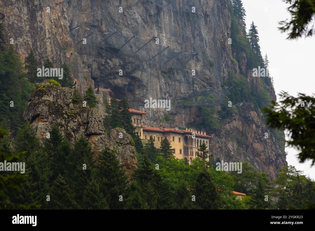 Sumela Monastery aka Sumela Manastiri view with cliffs and trees. Visit ...