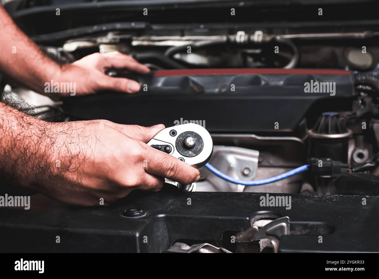 Mechanic working on car engine with tools , Car repair concept Stock ...