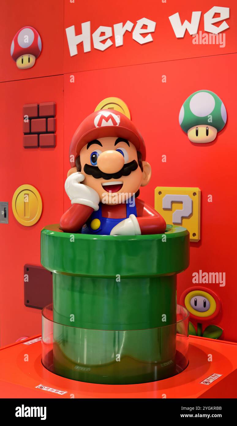 Mario elbows at pipe opening Stock Photo - Alamy