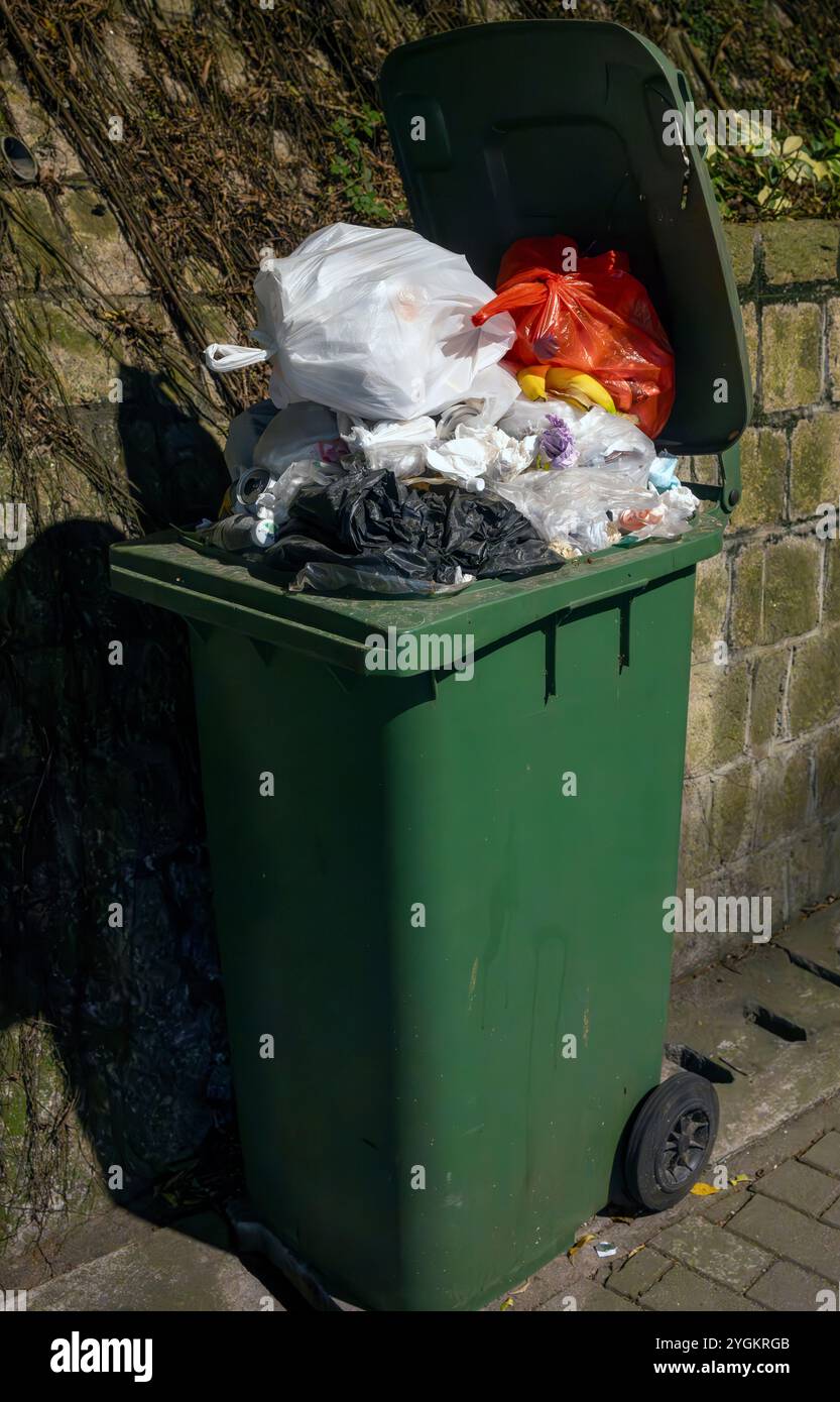 Overflowing rubbish bin, Hong Kong’s ban on single-use plastic items has come into effect 2024 ...