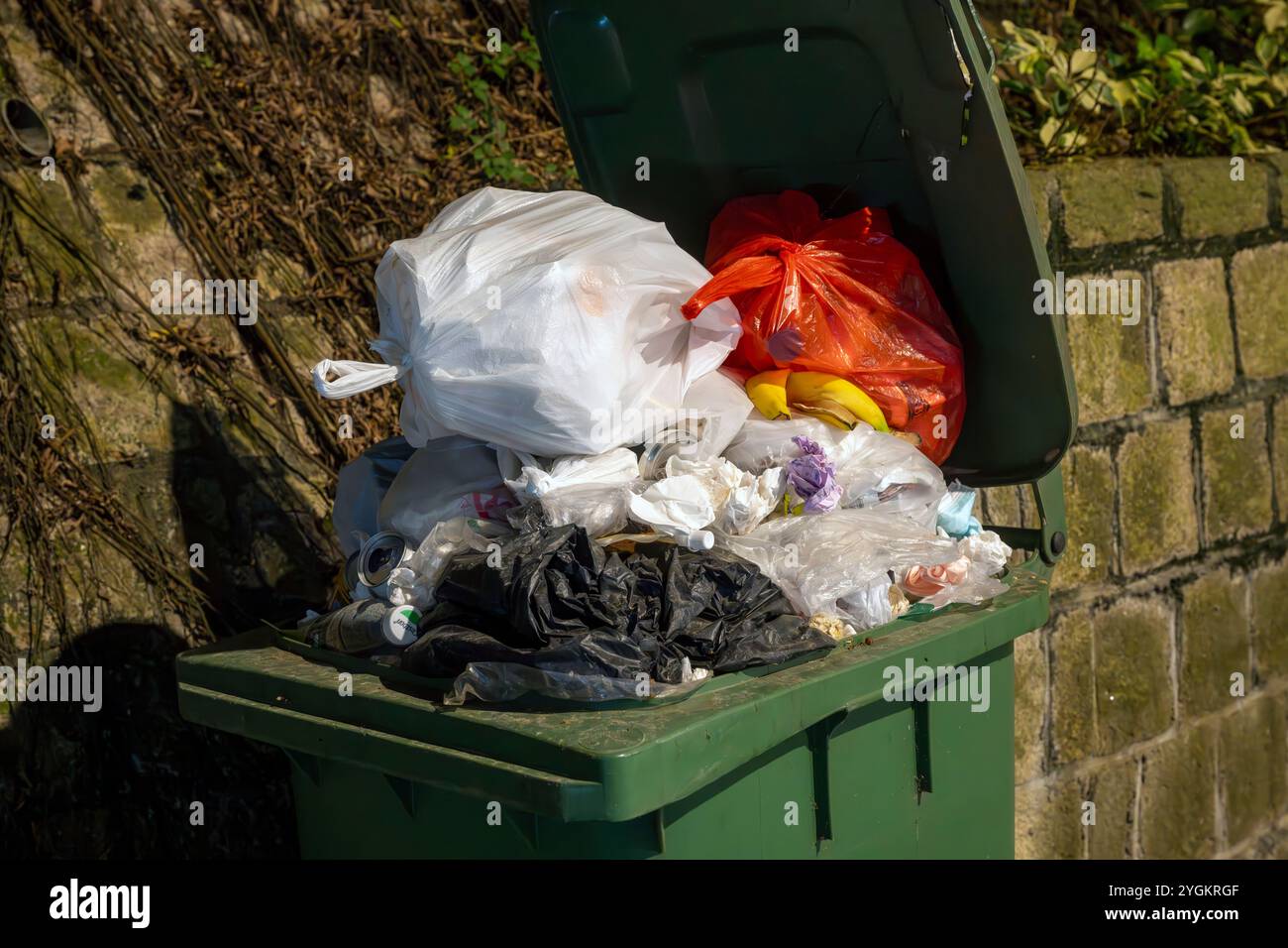 Overflowing rubbish bin, Hong Kong’s ban on single-use plastic items has come into effect 2024 ...