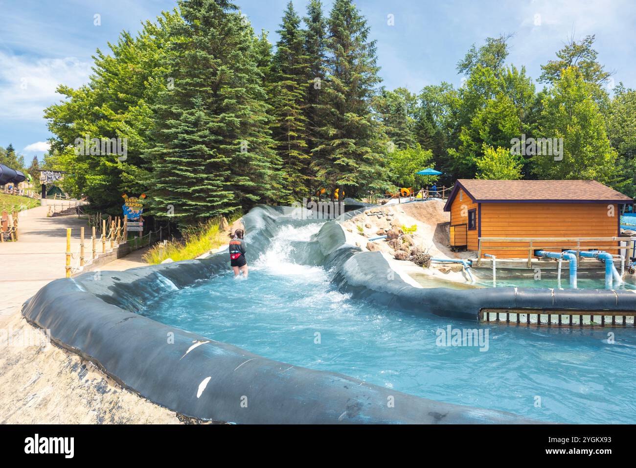 Old Forge, NY - Jun 25, 2024: Wide View of Raging Rapids River of the ...