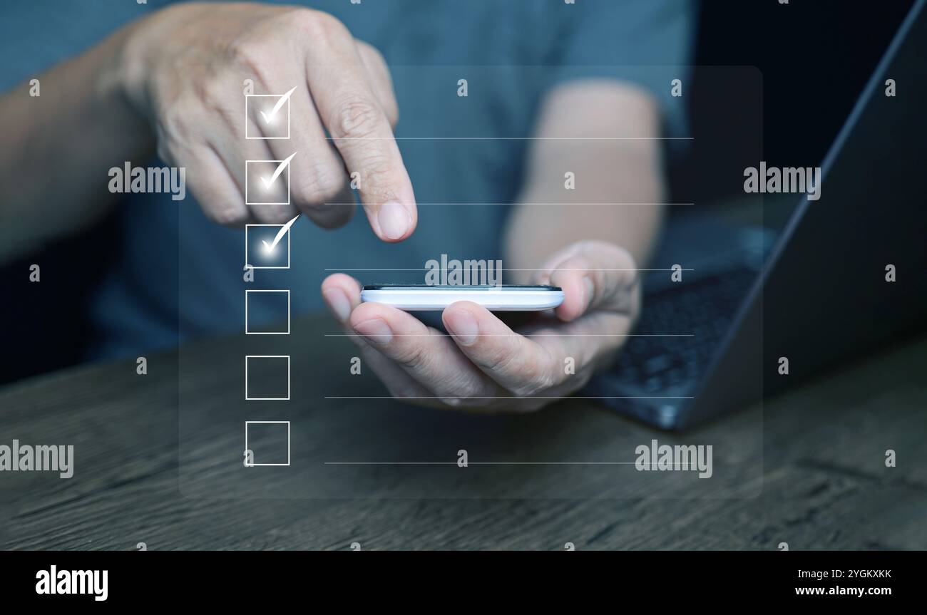 Business checklist concept. A man tapping on online performance ...