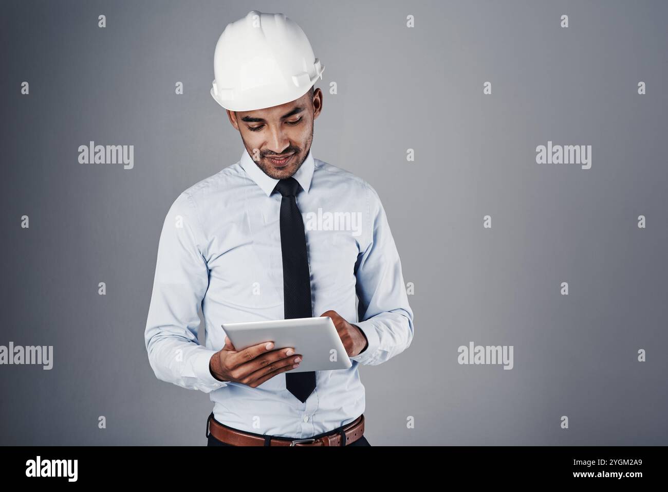 Engineer, tablet and construction worker with digital research and ...