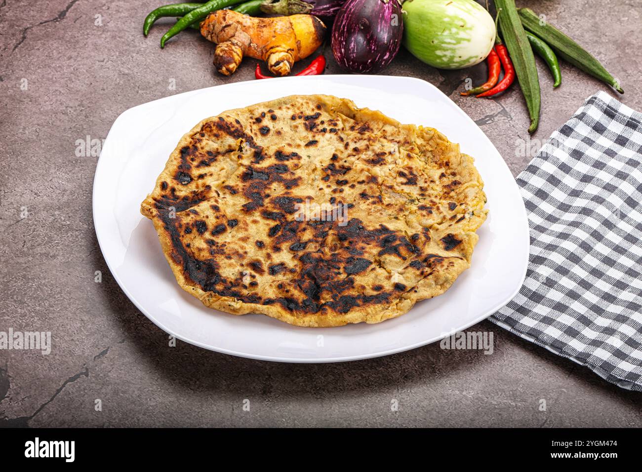 Indian cuisine stuffed Aloo paratha - bread with potato Stock Photo - Alamy