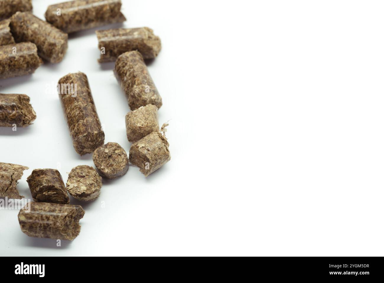 stack of wooden pellets for bio energy, white background, isolated ...