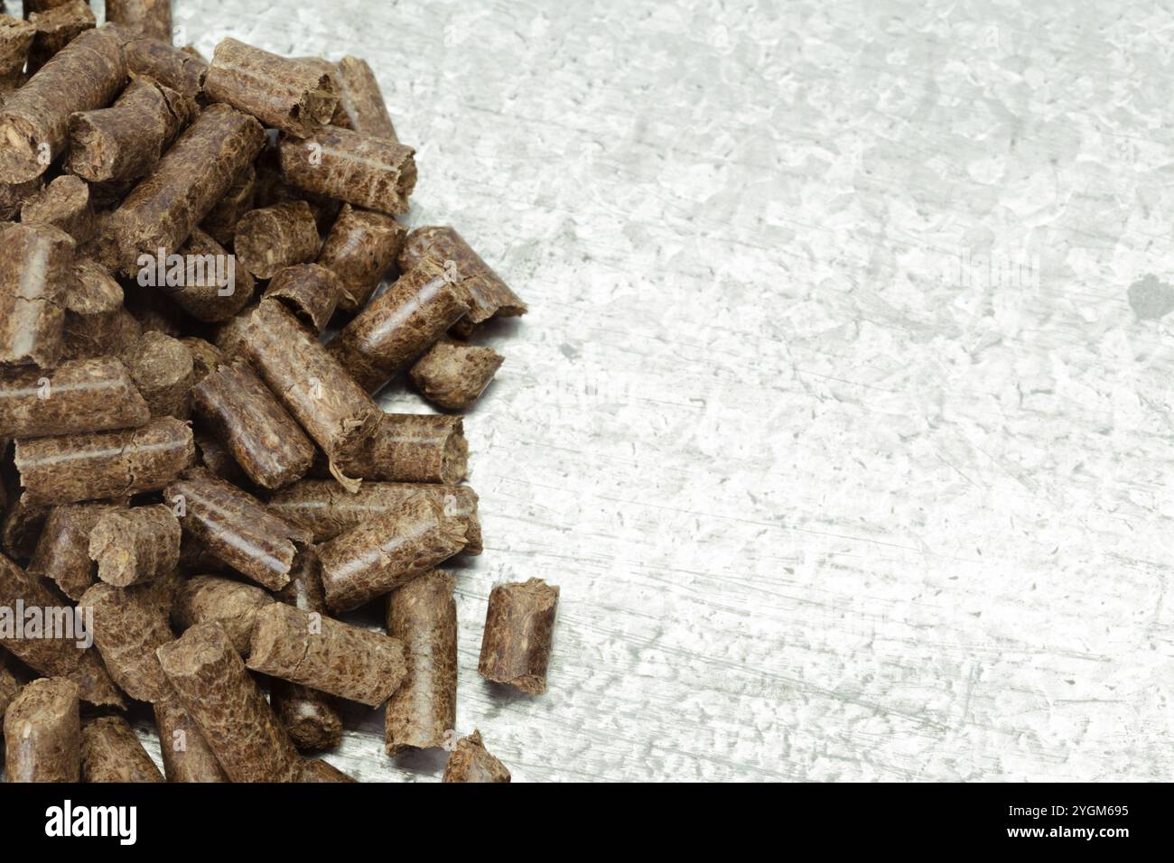 Resource. Pellets on the table Stock Photo - Alamy