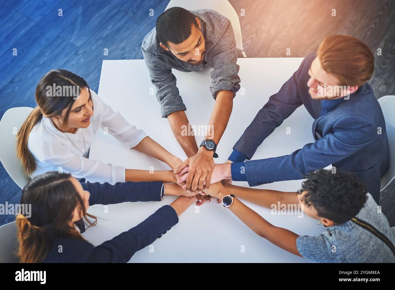 Business people, team and above with hands together for meeting ...