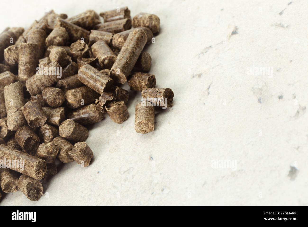 Energy. Pellets on the table Stock Photo - Alamy