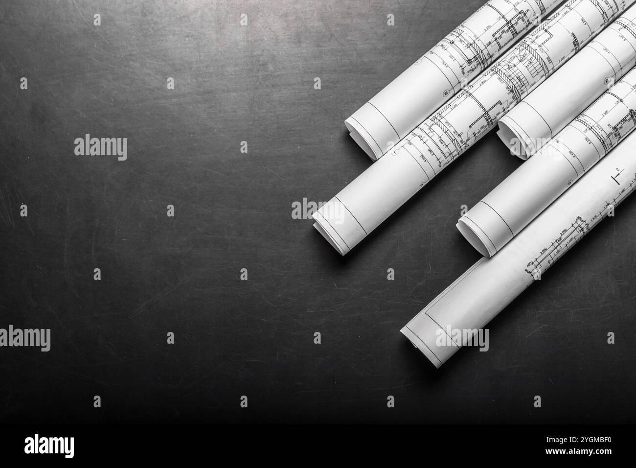 Construction planning drawings on black background Stock Photo - Alamy
