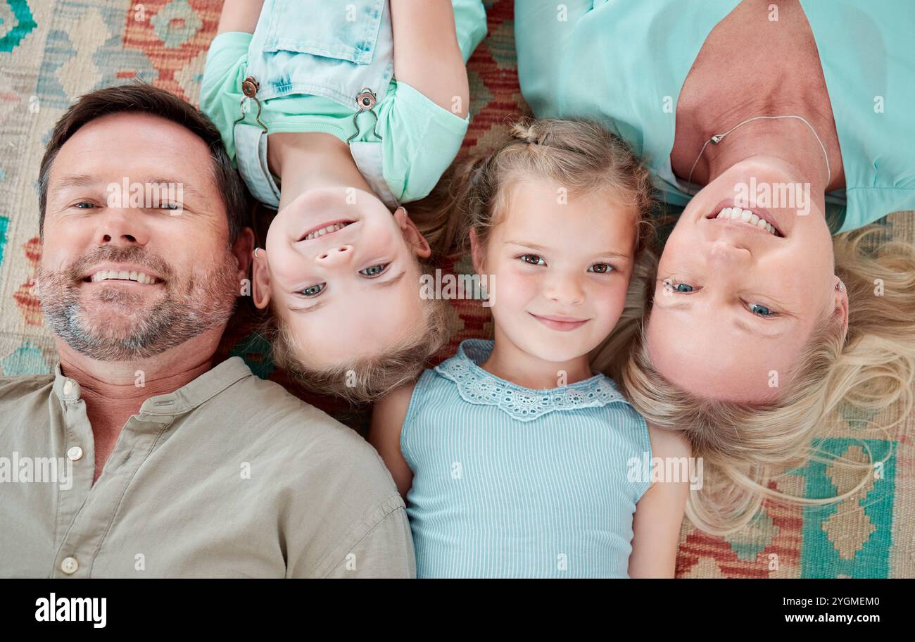 Parents, portrait and children in top view for bonding, development and ...