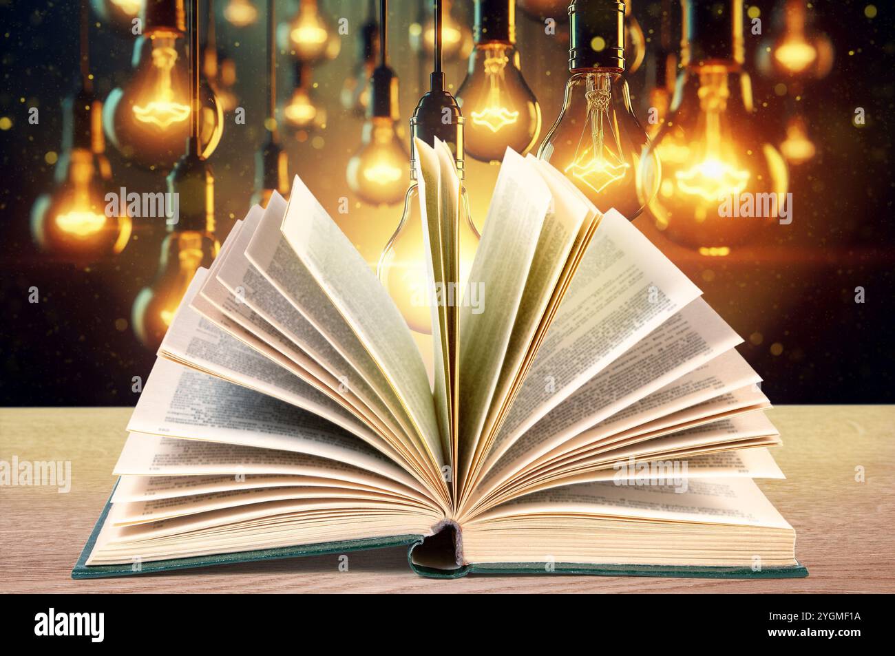 An open book lies on a wooden surface, surrounded by glowing light bulbs. This image evokes ...
