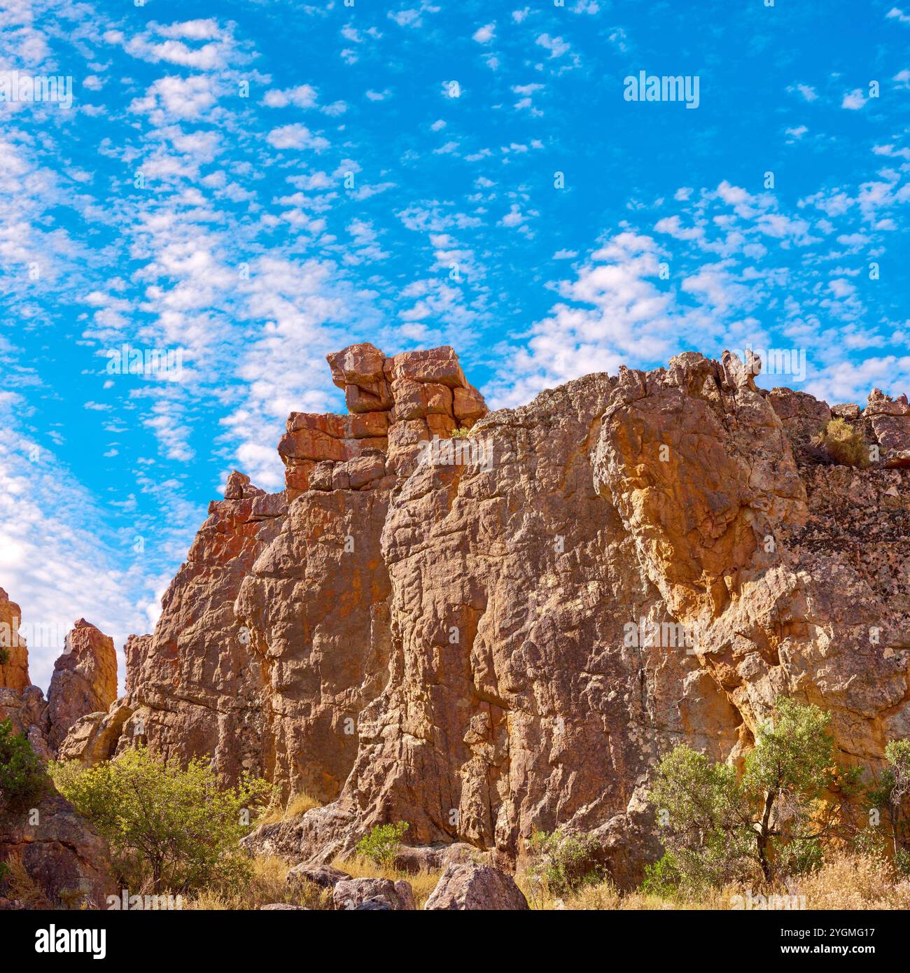 Outcrop, erosion and sky with rock, formation and geology at location ...