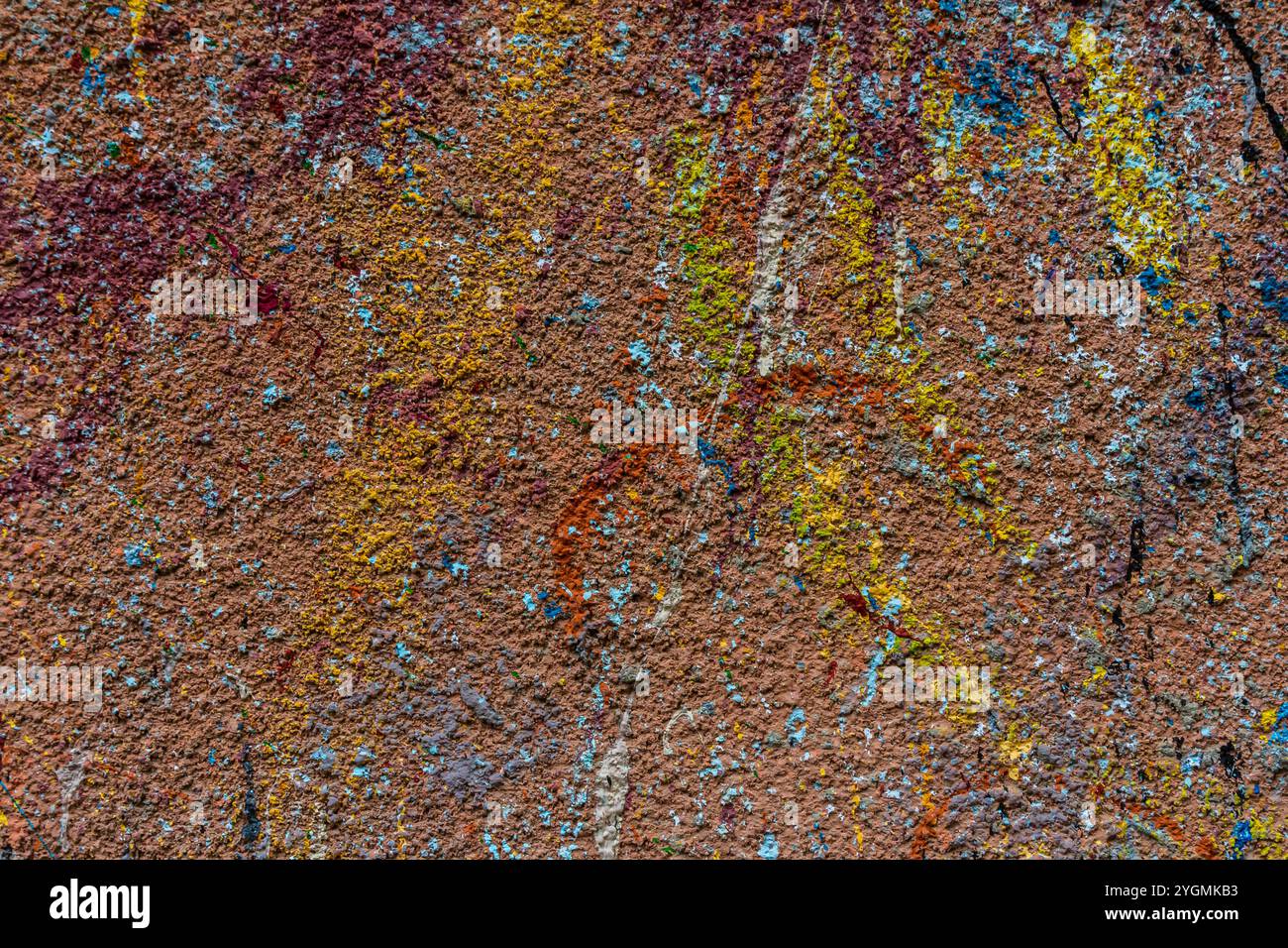 White plastered wall splattered with red paint. Paint splashes on the ...