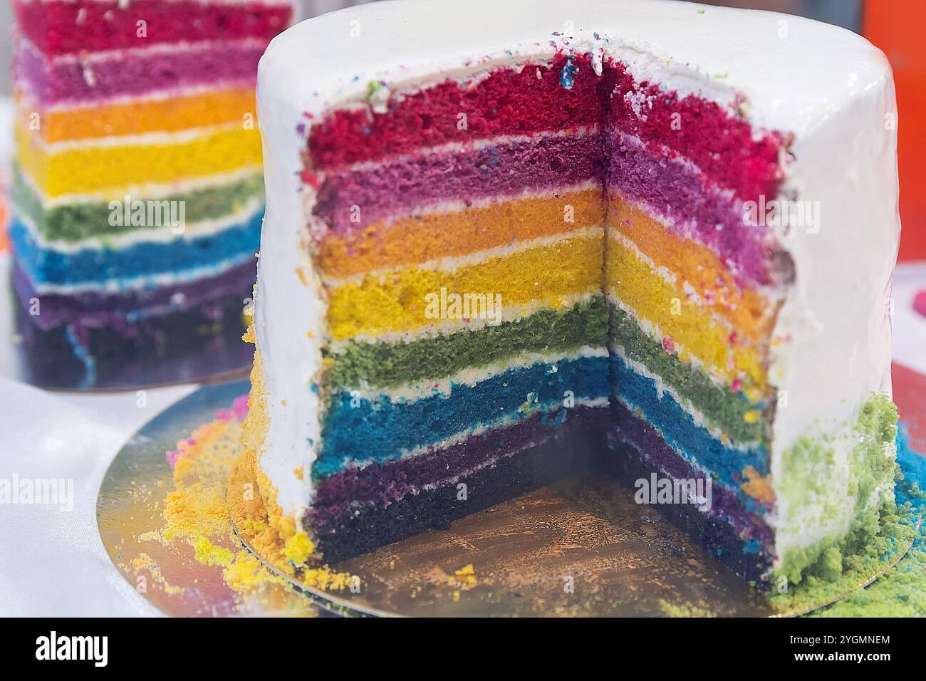 Beautiful multi-colored cake in a showcase. Festive dessert Stock Photo ...