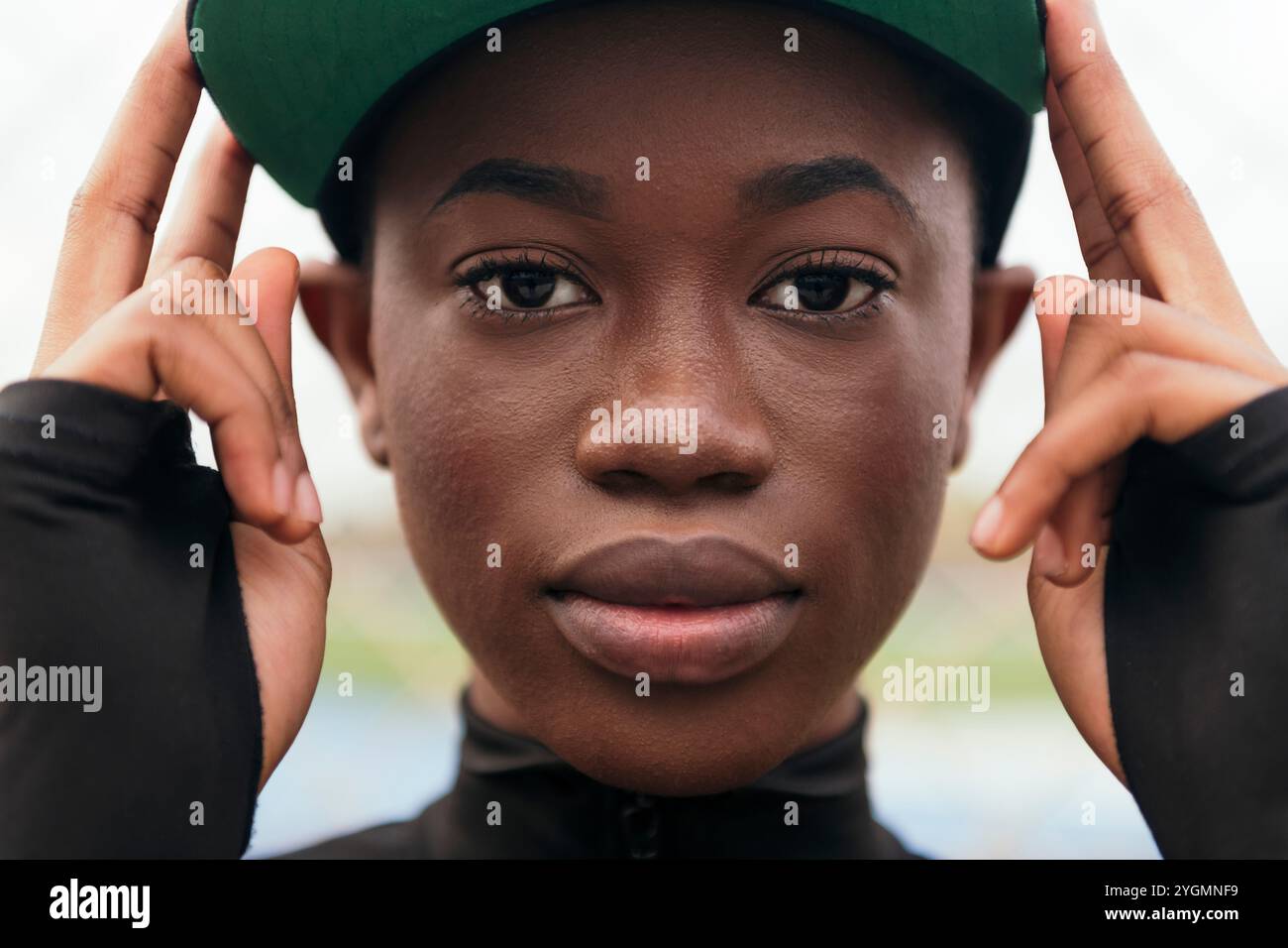 African american woman adjusting face hi-res stock photography and ...