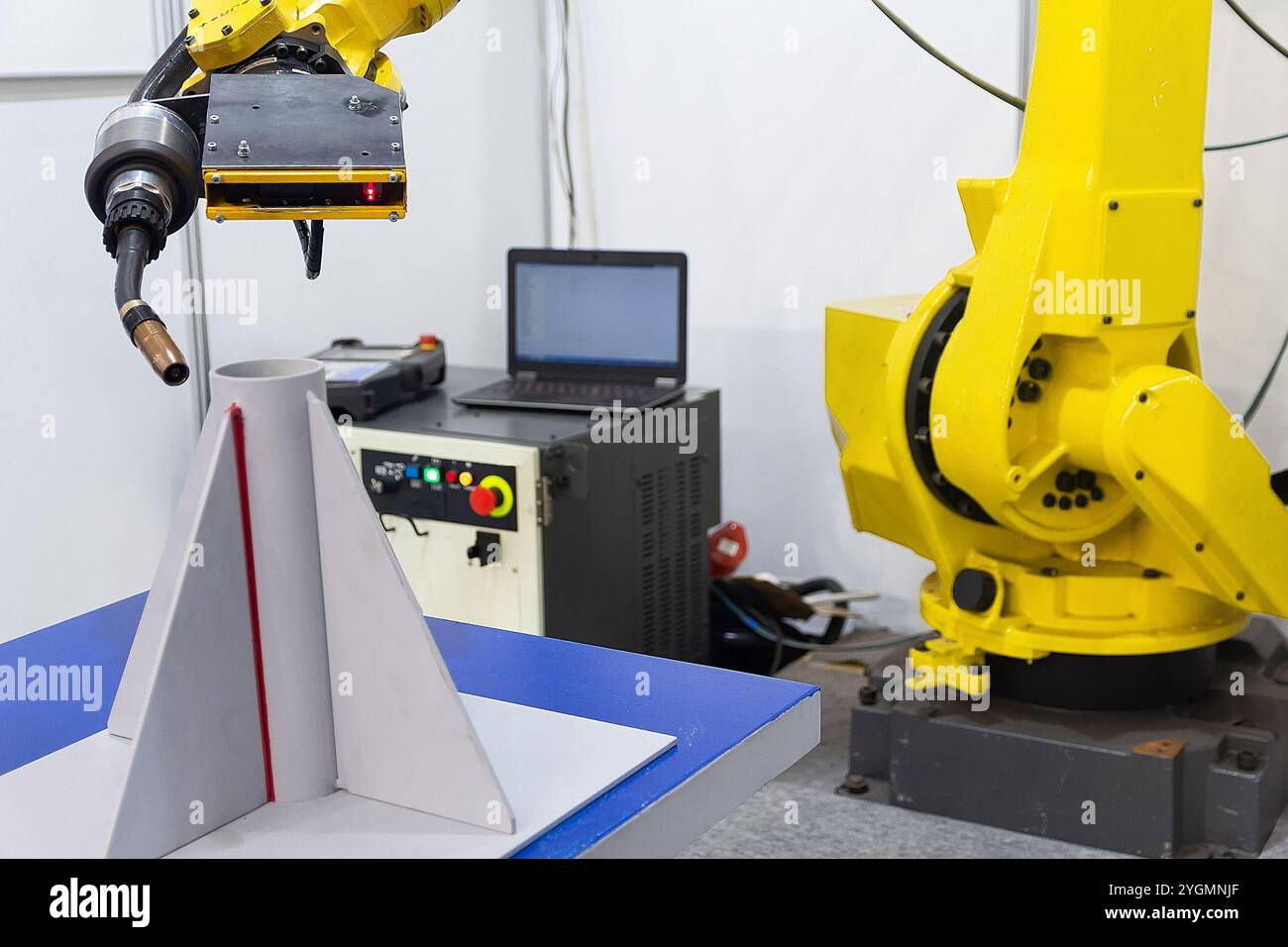 Industrial robot for automatic welding in a factory. Industry Stock ...