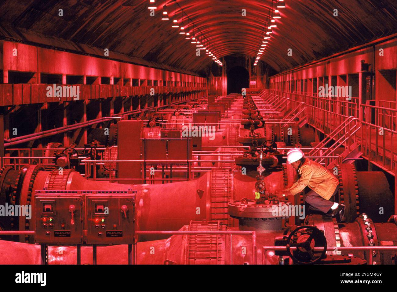 A man works in an underground water valve chamber in the Bronx, New ...