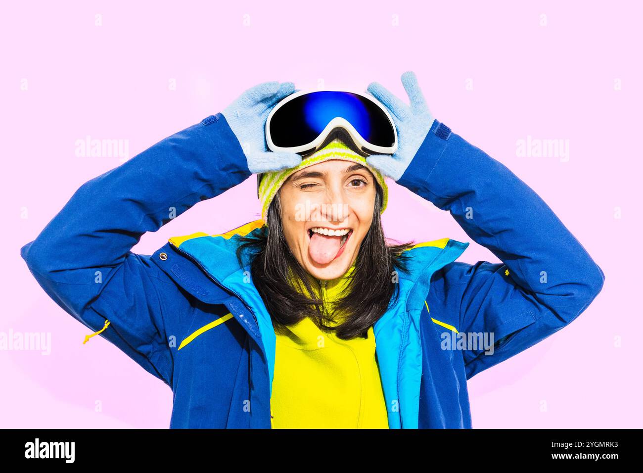 Close up portrait pretty young woman front view wear winter ski outfit ...
