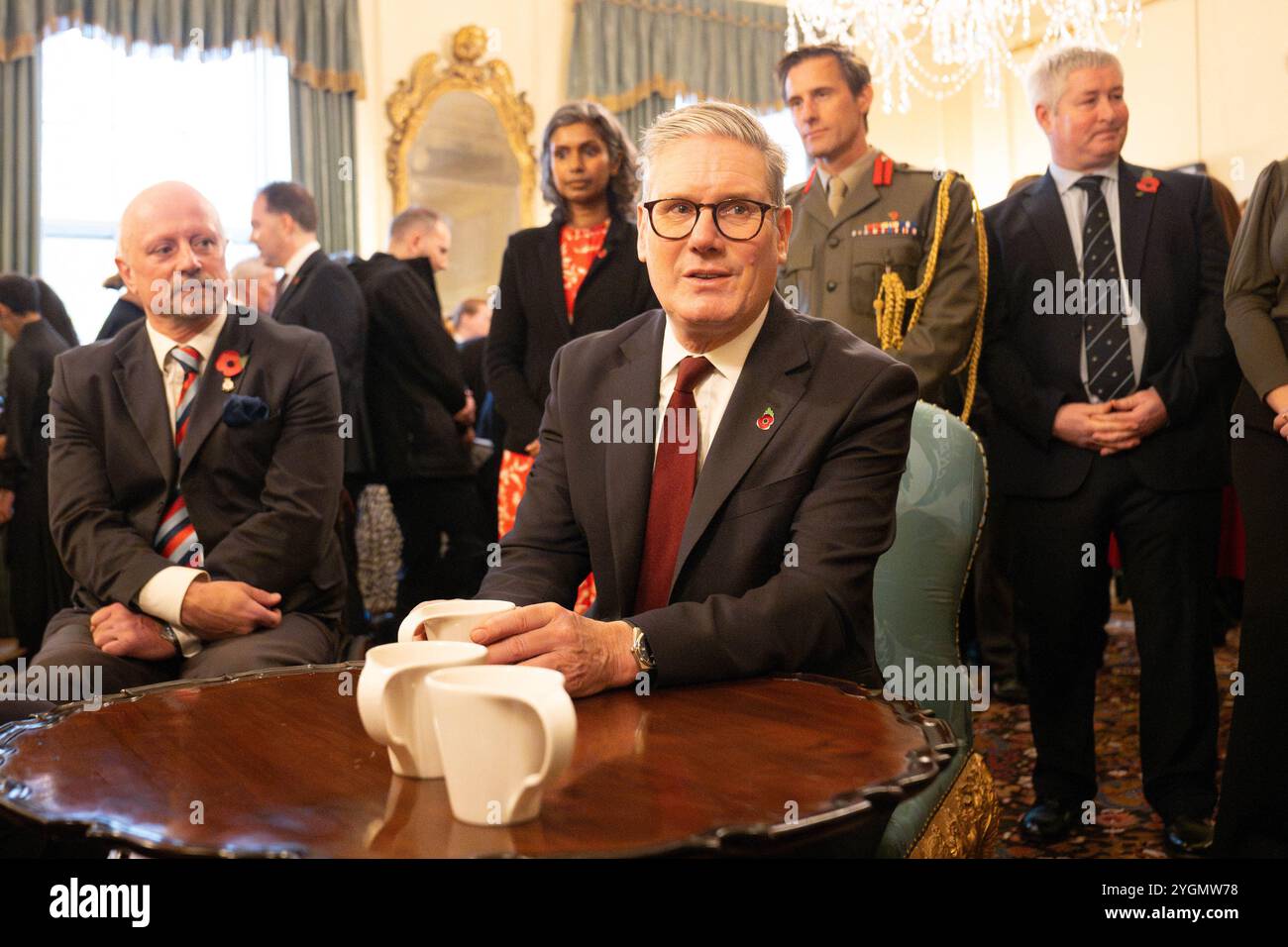 Prime Minister Sir Keir Starmer speaks with guests during a reception ...