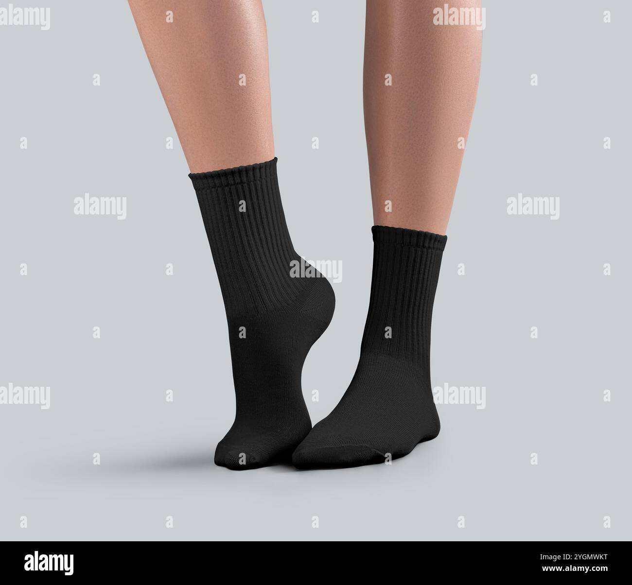 Mockup of black medium socks on female feet, one ankle stretched ...