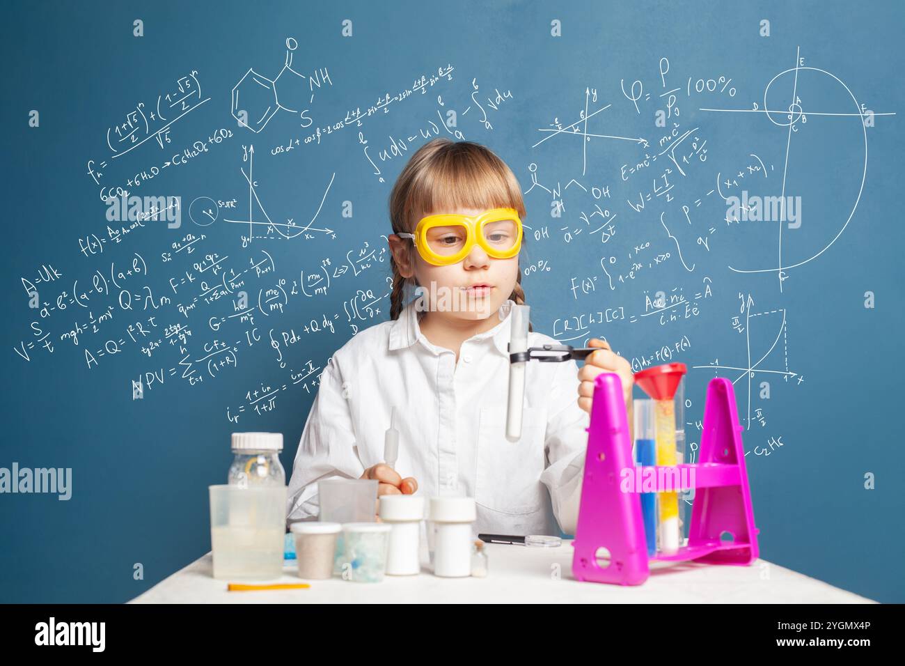 School student girl doing science experiment in classroom Stock Photo ...