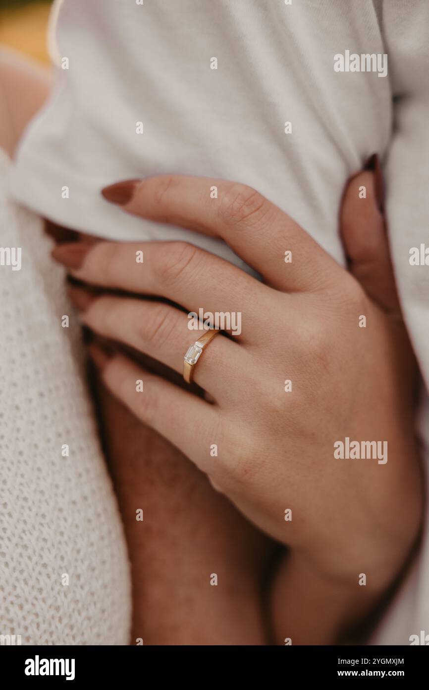 Fall Engagement Ring on couple with beautiful nails Stock Photo - Alamy