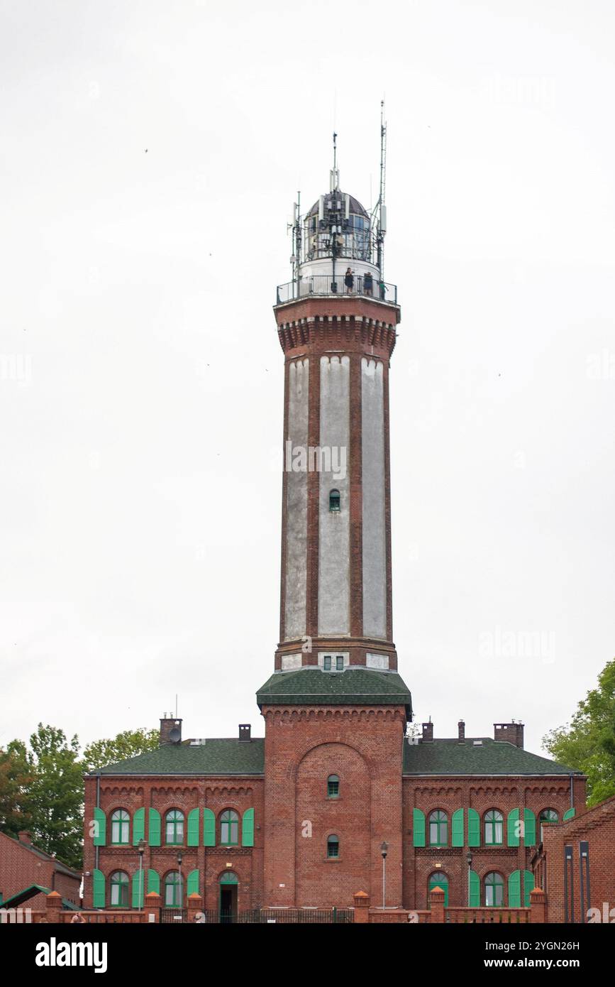 The Niechorze Lighthouse, located on the Baltic coast of Poland, stands ...