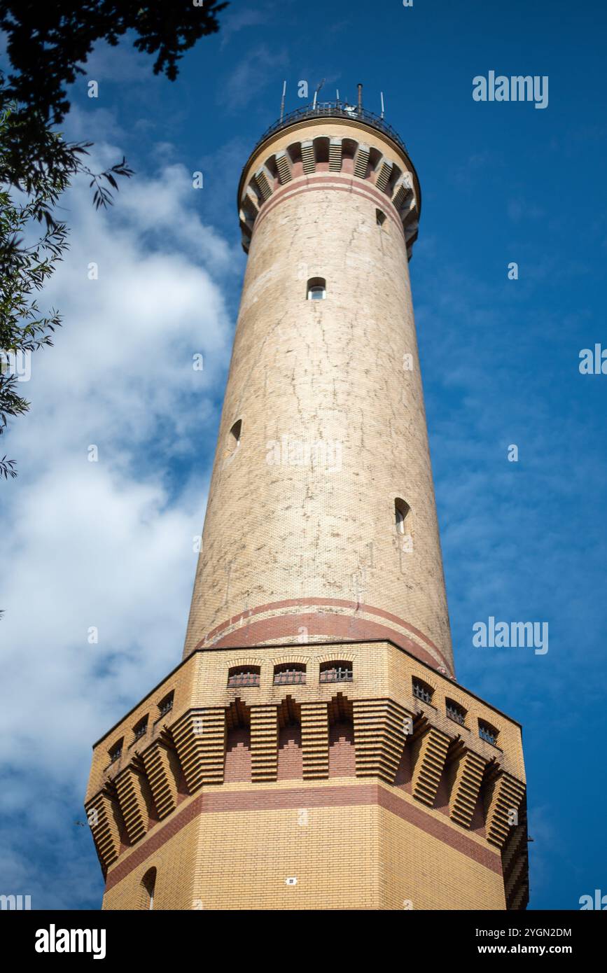 The lighthouse in Swinoujscie, Poland, stands tall against the backdrop ...