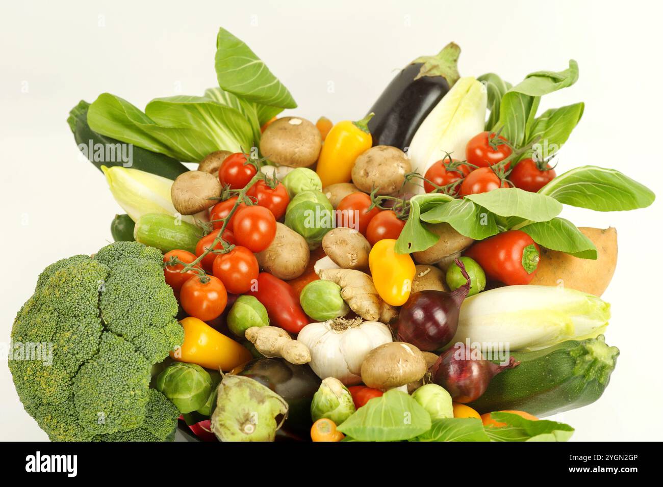 Raw mixed organic vegetables in the lower part of the frame. Includes ...