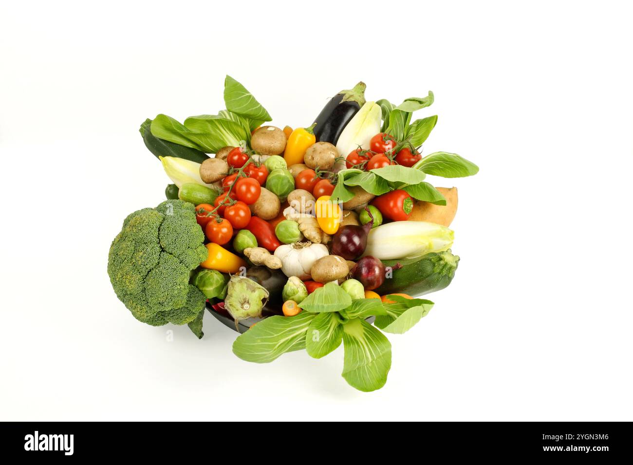 Raw mixed organic vegetables photographed from a higher angle above, on ...
