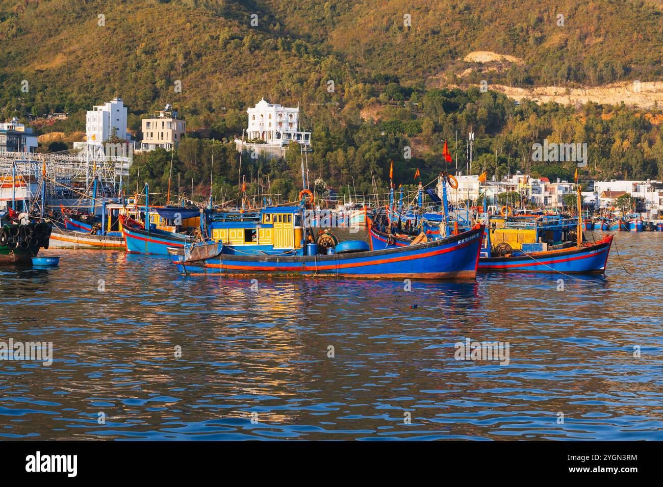 Vietnamese fishing boats and ships in harbor at sea at the fishing port ...