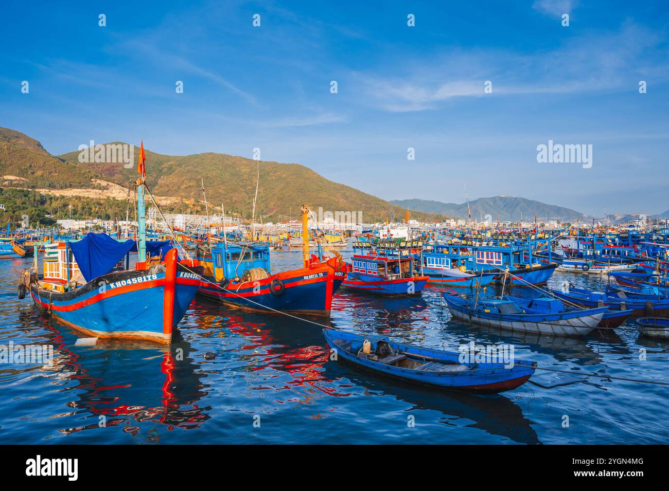 Vietnamese fishing boats and ships in harbor at sea at the fishing port ...