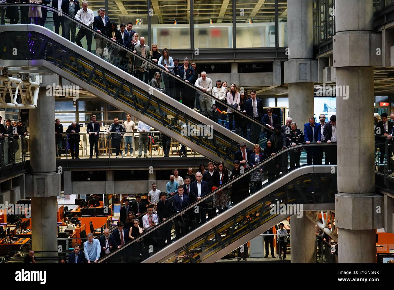 Staff line the atrium during the Lloyd's of London Armistice ...