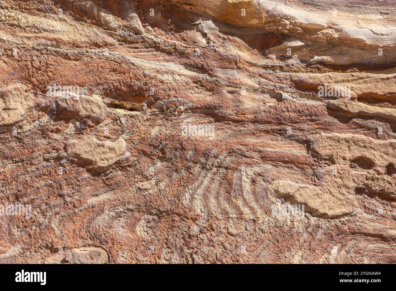 Multi-colored sandstone rock and mineral layers in ancient tombs of ...