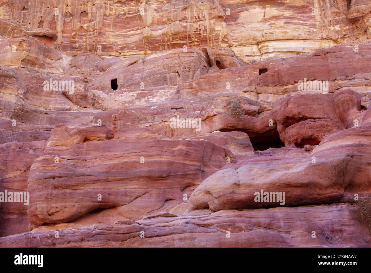 Sandstone rock caves formations in Petra, Jordan, UNESCO World Heritage ...