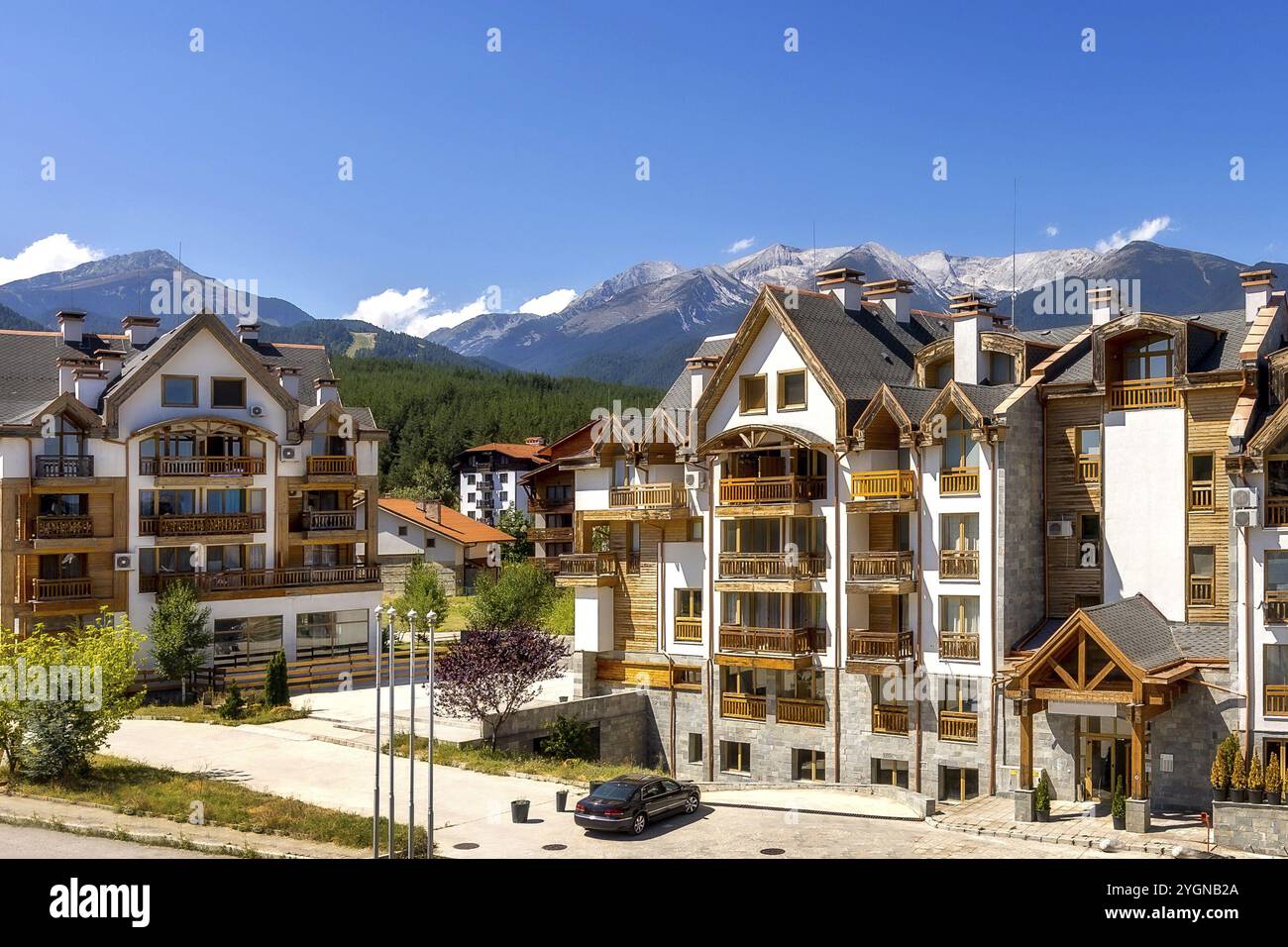 Bansko, Bulgaria summer view with houses and Pirin peaks panorama Stock ...