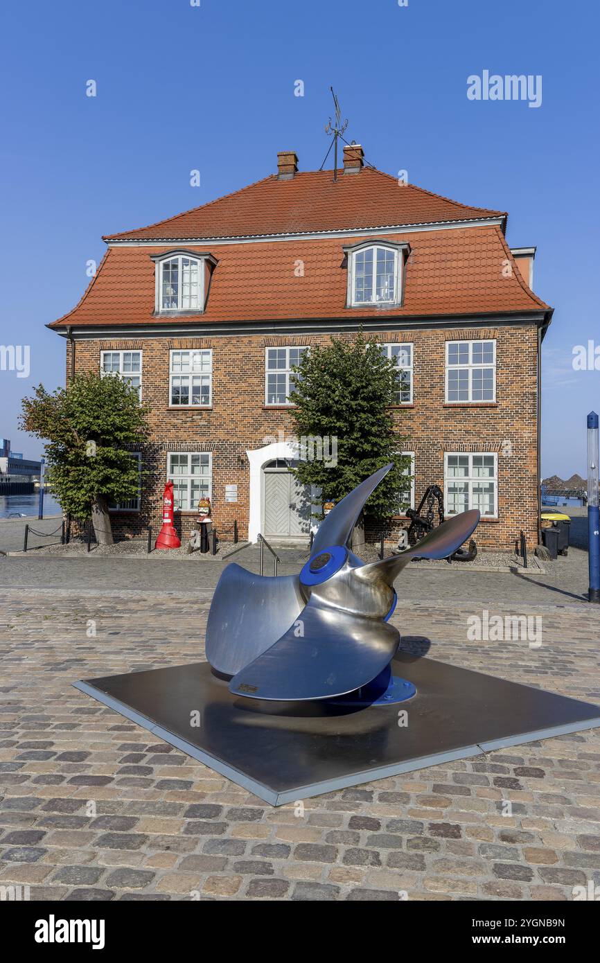 Baroque historic brick house tree house flanked by two Swedish heads ...