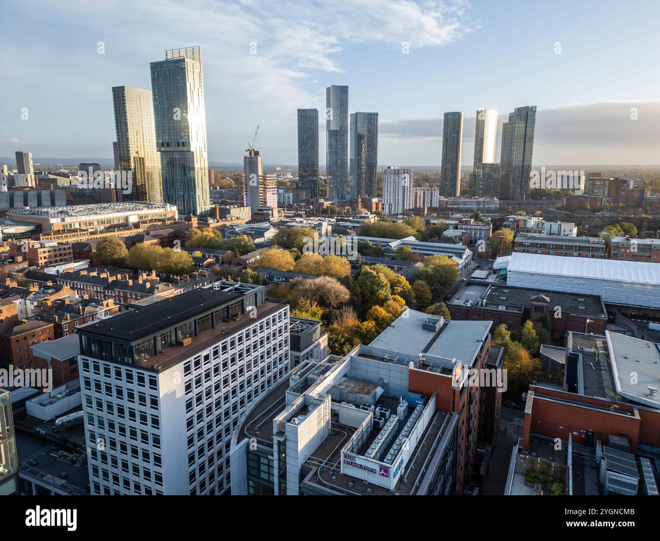 Manchester Spinningfields office buildings with skyscraper skyline ...