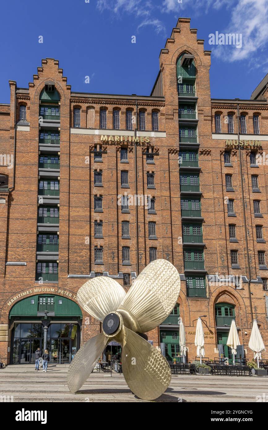 Ship's propeller in front of brick building International Maritime ...
