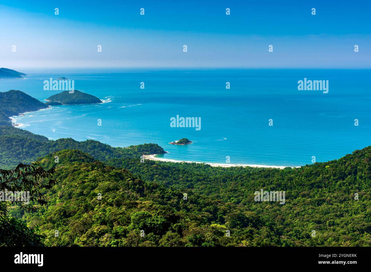 Arrival at Castelhanos beach in Ilhabela via a trail through the forest ...