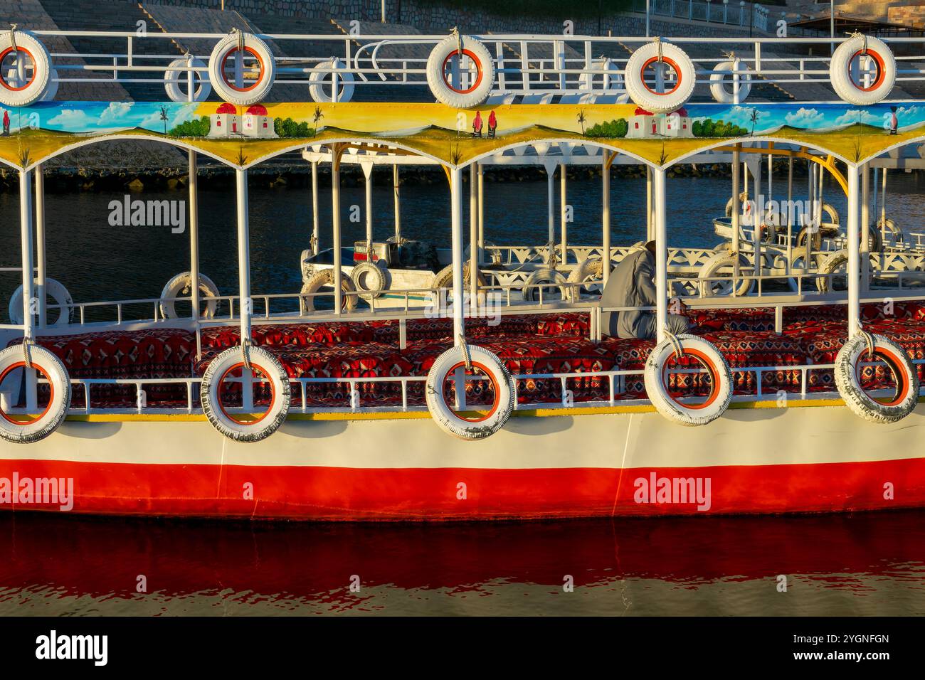 Close up of a traditional coloful motorboat ferry on the Nile river ...