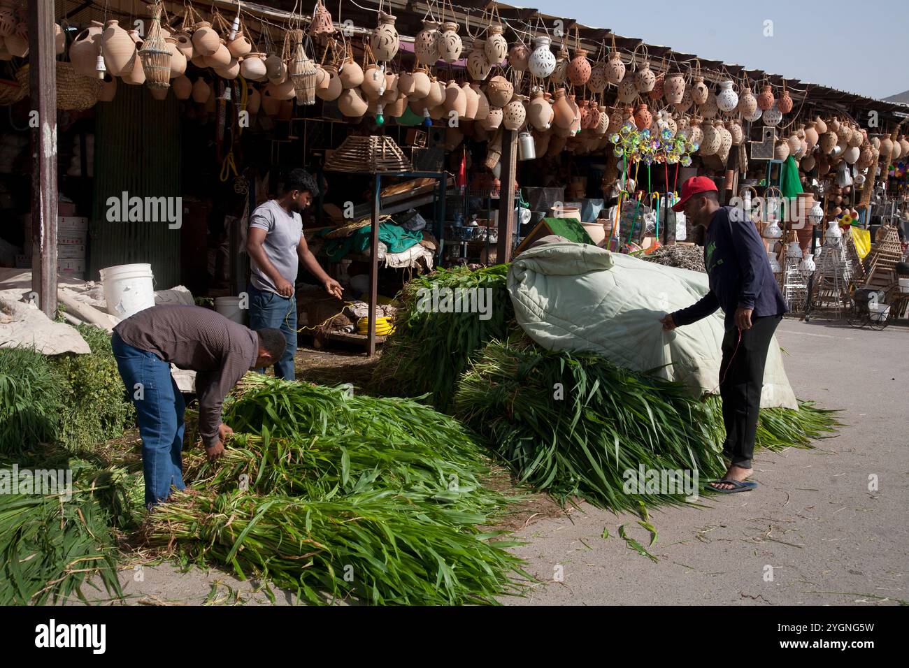 traditional clay pots hanging souq fanja al-hadith fanja oman middle ...