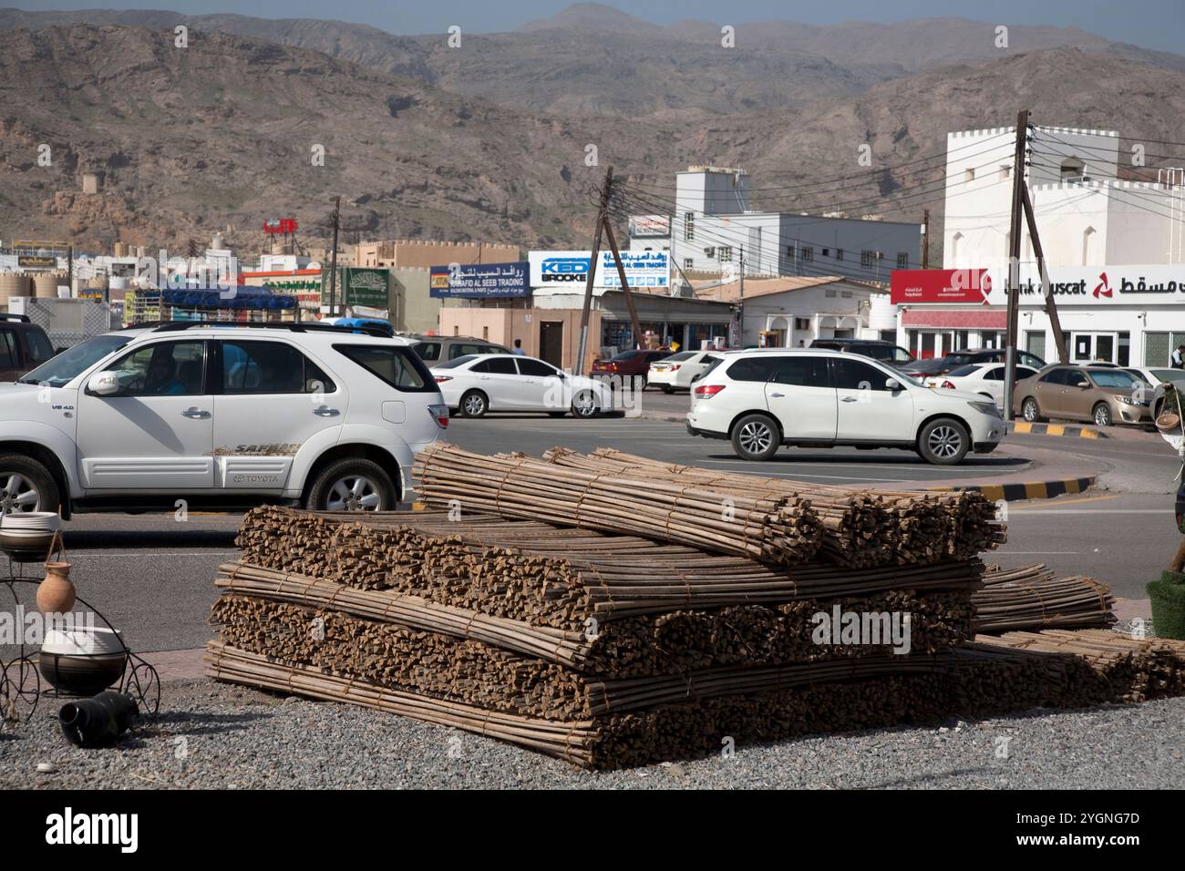 car park and shops fanja oman middle east Stock Photo - Alamy