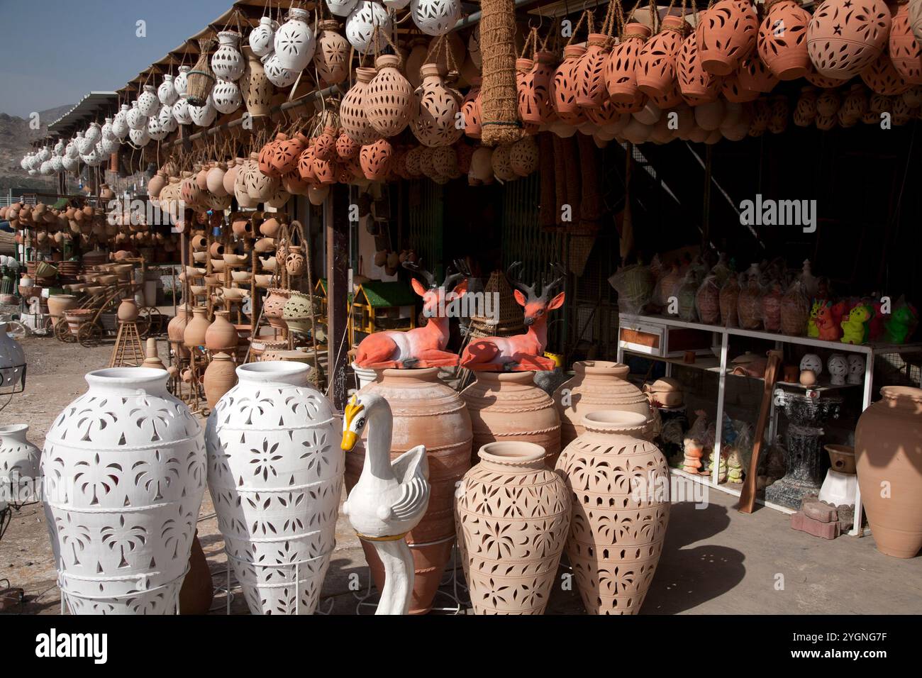 traditional clay pots hanging souq fanja al-hadith fanja oman middle ...