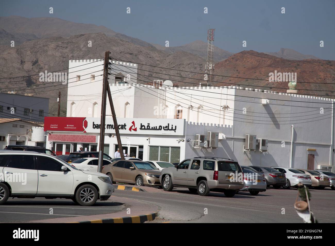 car park and shops fanja oman middle east Stock Photo - Alamy