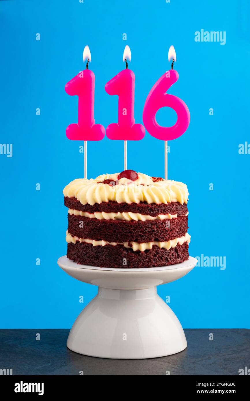 Red velvet birthday cake with number 116 candle Stock Photo - Alamy